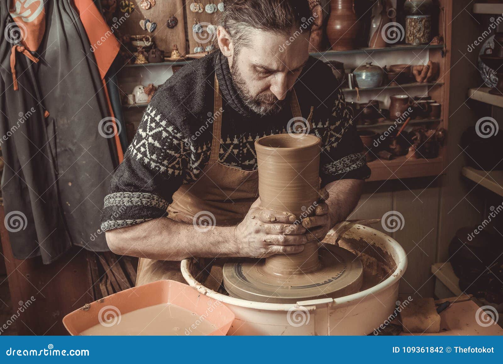 Elderly Man Making Pot Using Pottery Wheel in Studio Stock Photo ...