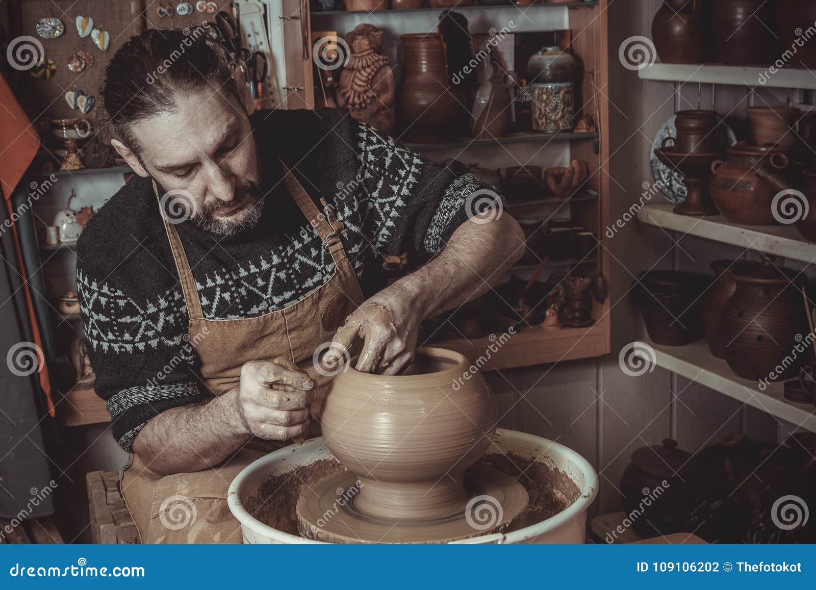 Elderly Man Making Pot Using Pottery Wheel in Studio Stock Photo ...