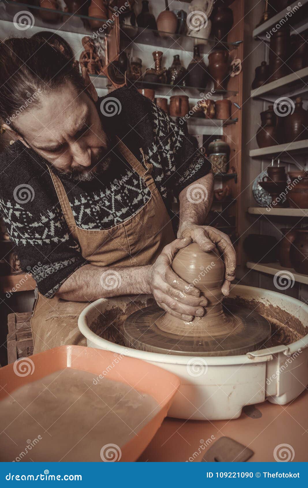 Elderly Man Making Pot Using Pottery Wheel in Studio Stock Photo ...