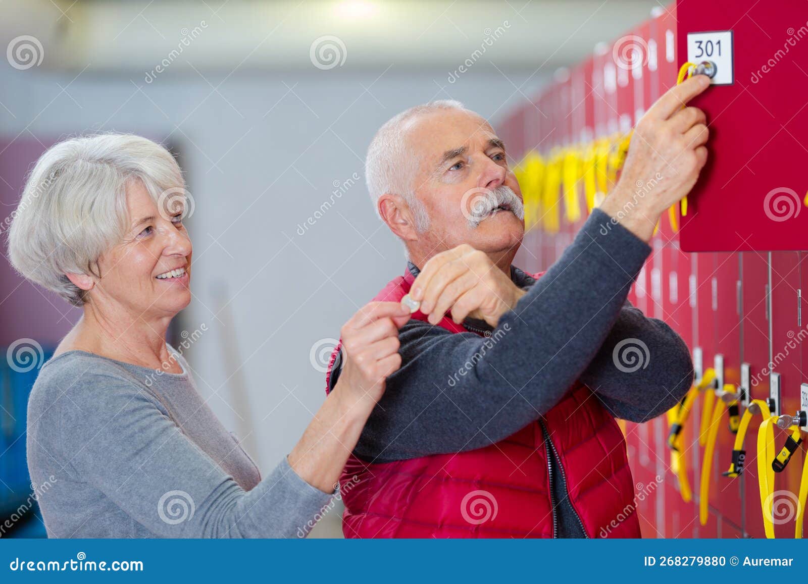 Elderly man opening locker stock photo. Image of design - 268279880