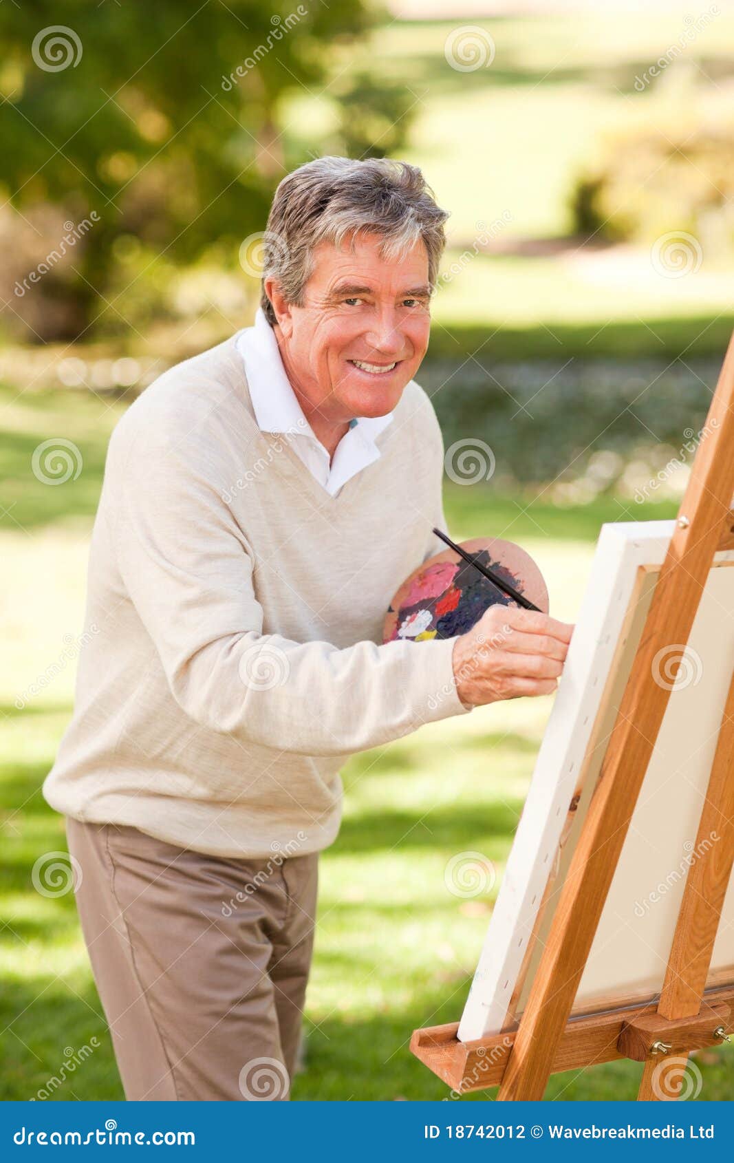 Elderly man painting stock photo. Image of mature, greenery - 18742012