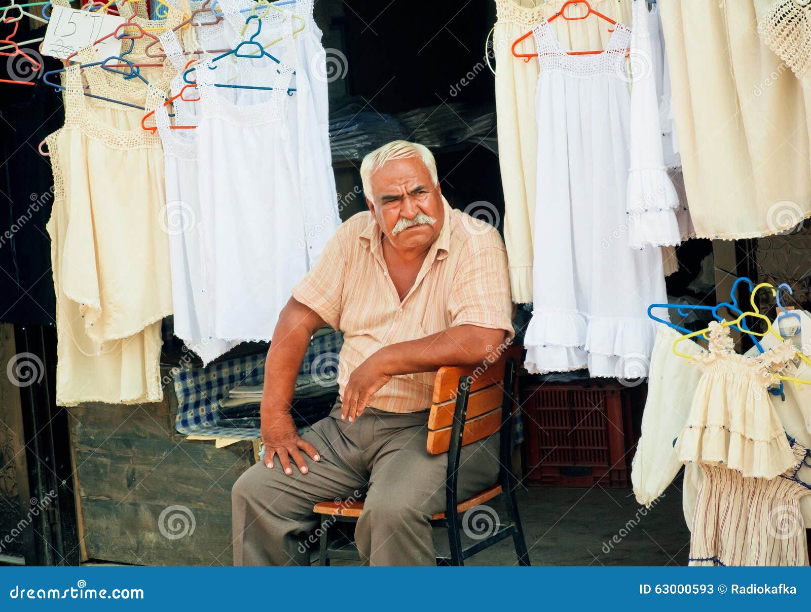 Elderly Man Sells Lingerie and Clothes on Street Market of Old Turkish ... Elderly Man Sells Lingerie and Clothes on Street Market of Old Turkish ...