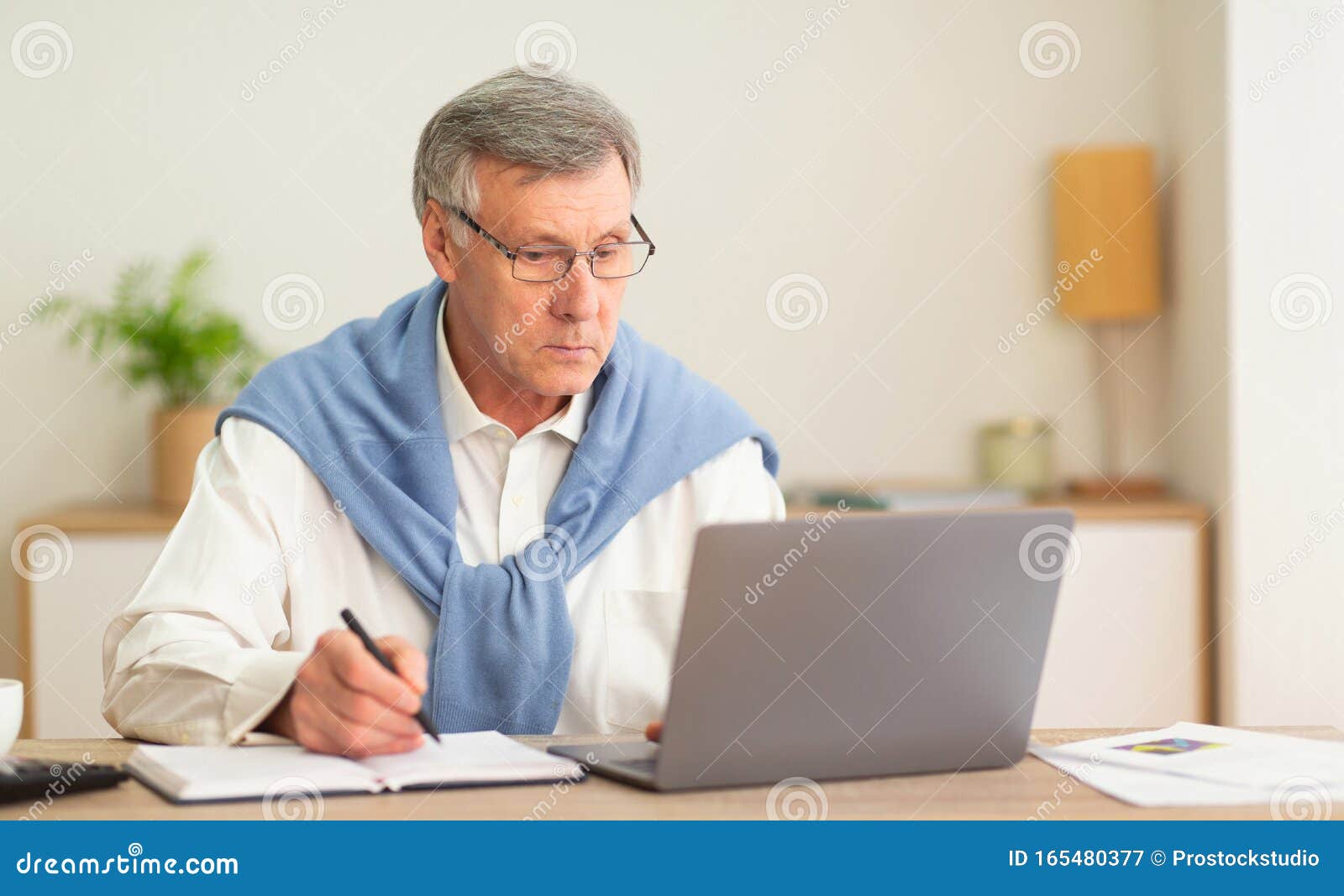 Elderly Man Using Laptop Working in Modern Office Stock Image - Image ...
