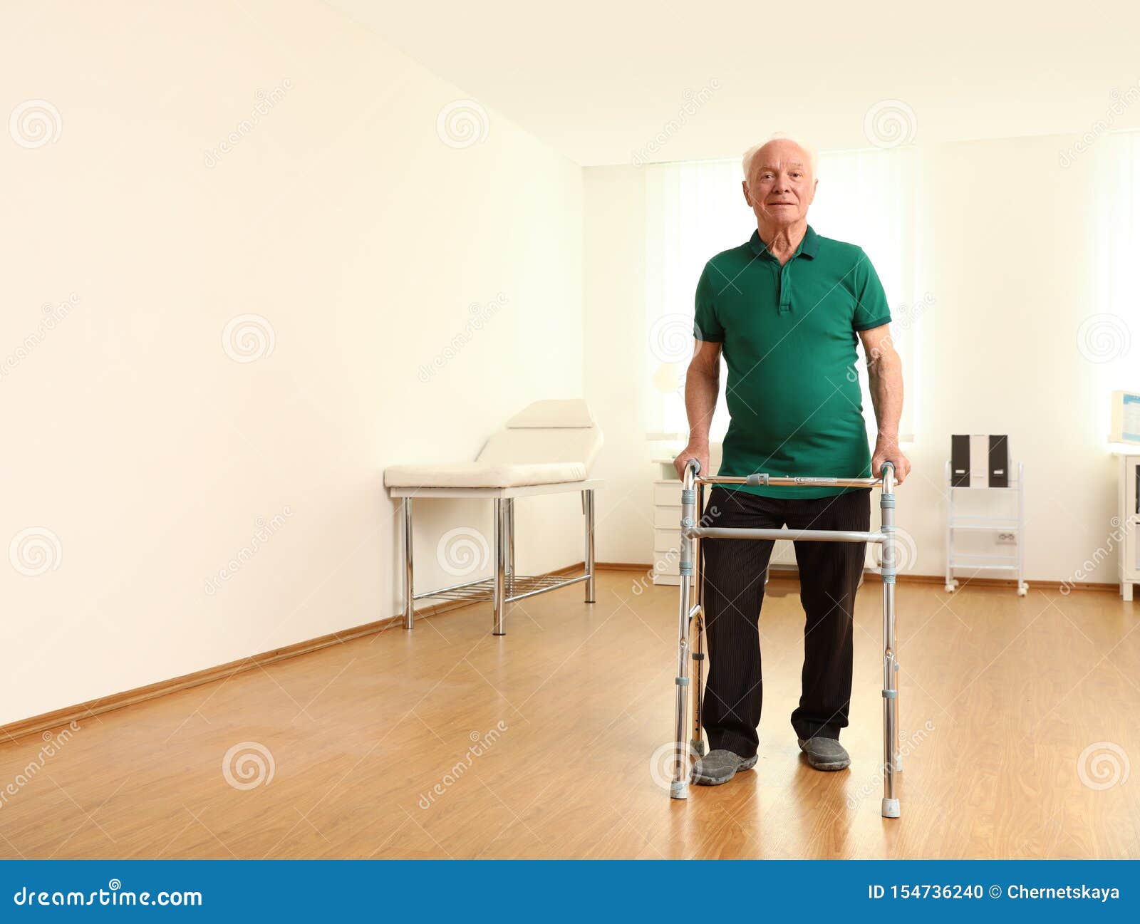 Elderly Man Using Walking Frame Indoors. Stock Photo - Image of ...