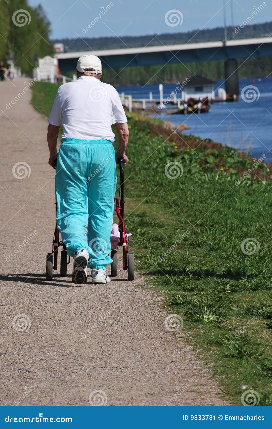 Elderly Man Walking Outdoors With Walker Stock Image - Image: 9833781