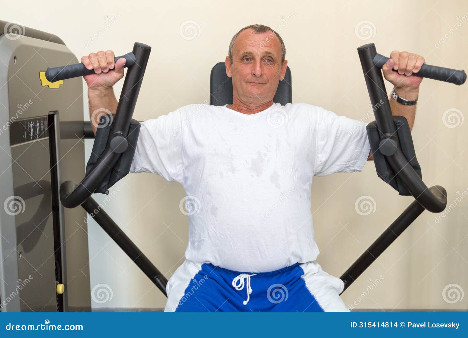 Elderly Man on a Weight Machine in the Stock Photo - Image of jogging ...