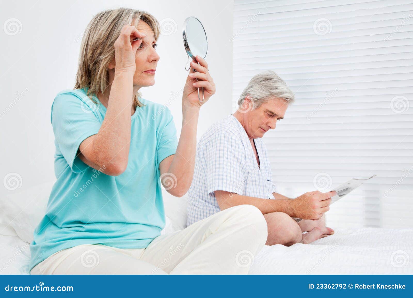 Elderly Married Couple in Bedroom Stock Photo - Image of elderly ...
