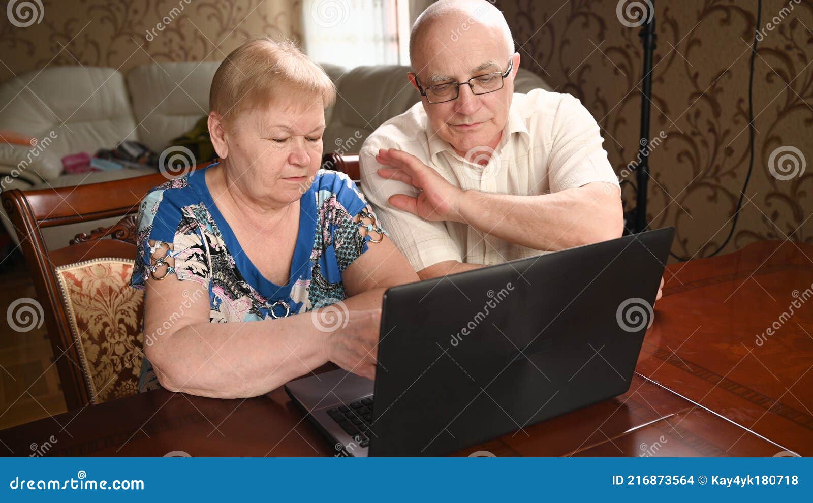 Elderly Married Couple Sitting at the Computer Upset by What they Saw ...