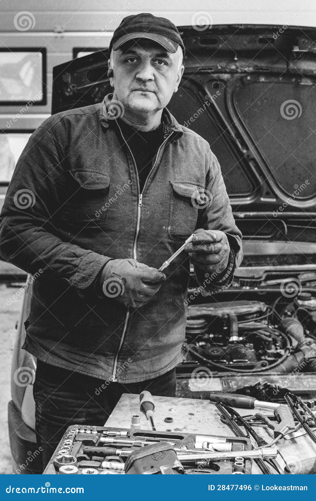 Elderly Mechanic in Front of Car B/w Stock Photo - Image of dirty ...