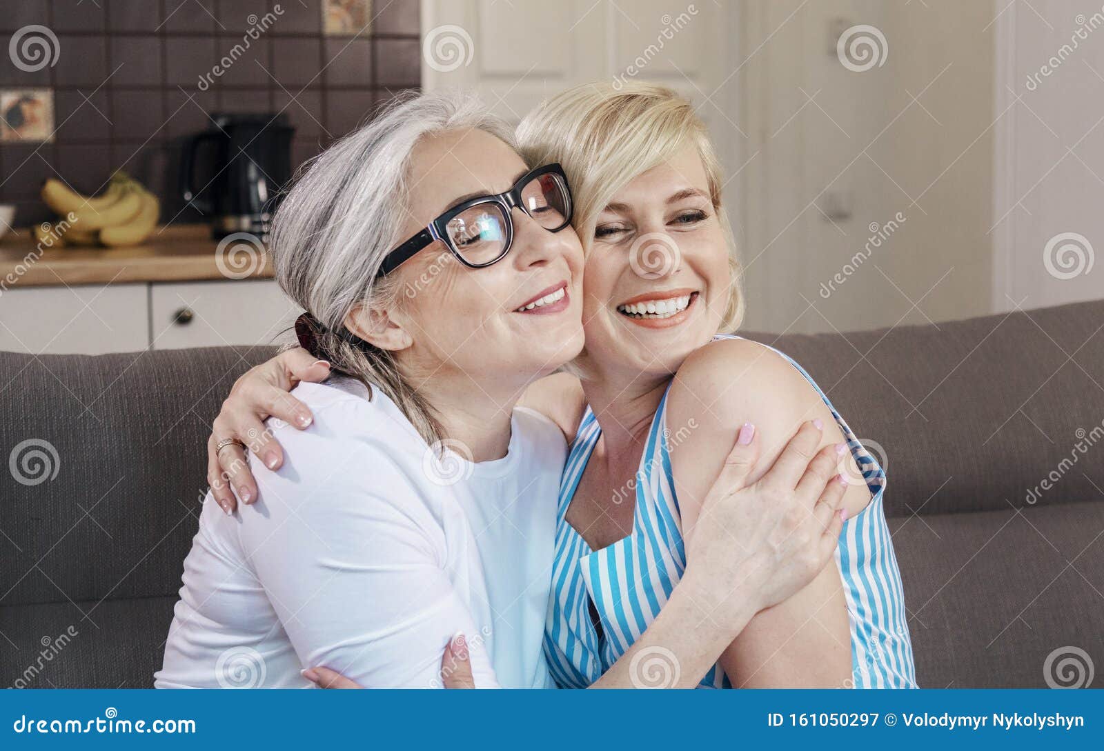 Elderly Mother And Her Young Adult Daughter Hugging Stock Image Image