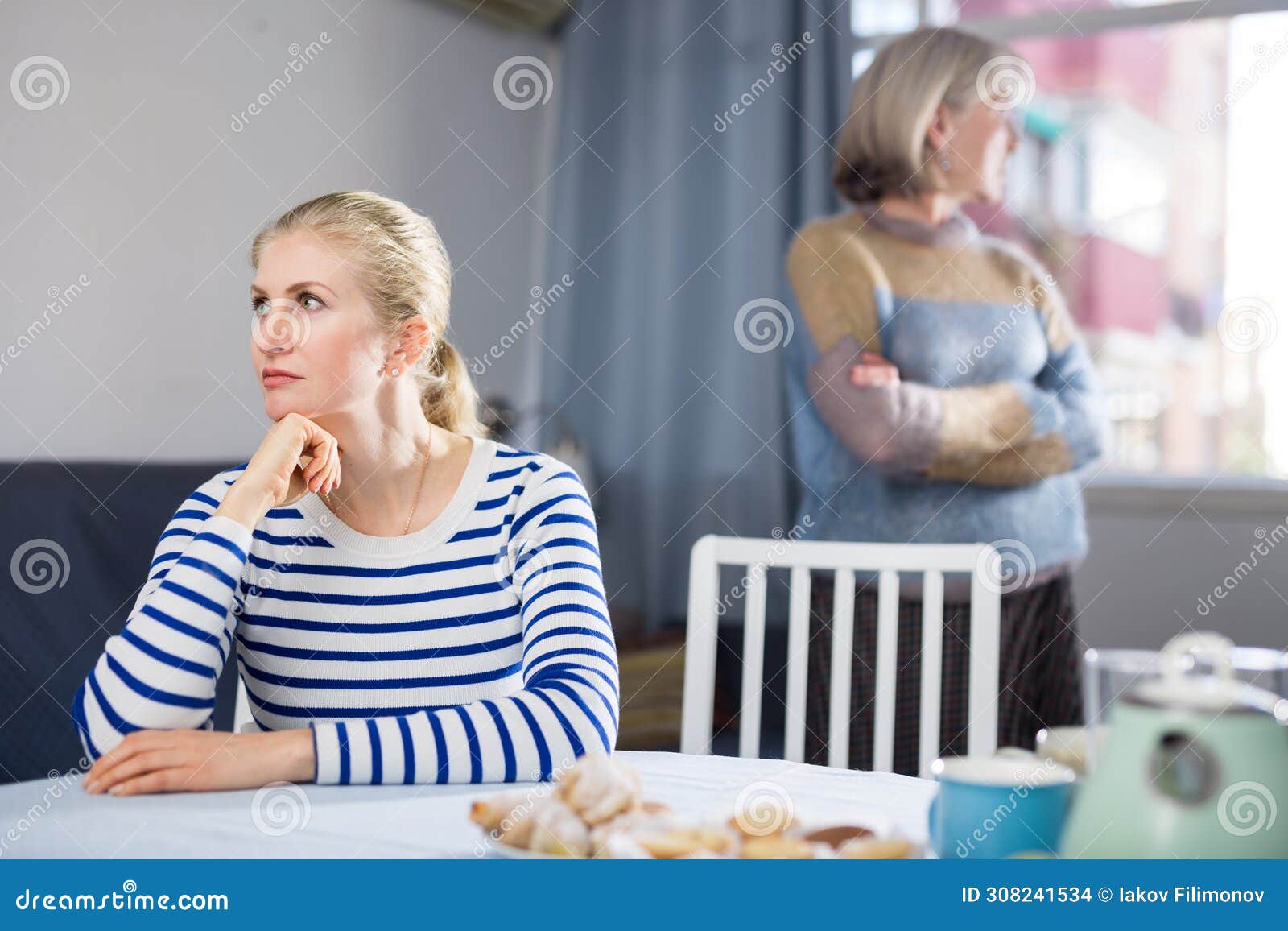 Elderly Mother Is Unhappy With Her Adult Daughter During Domestic
