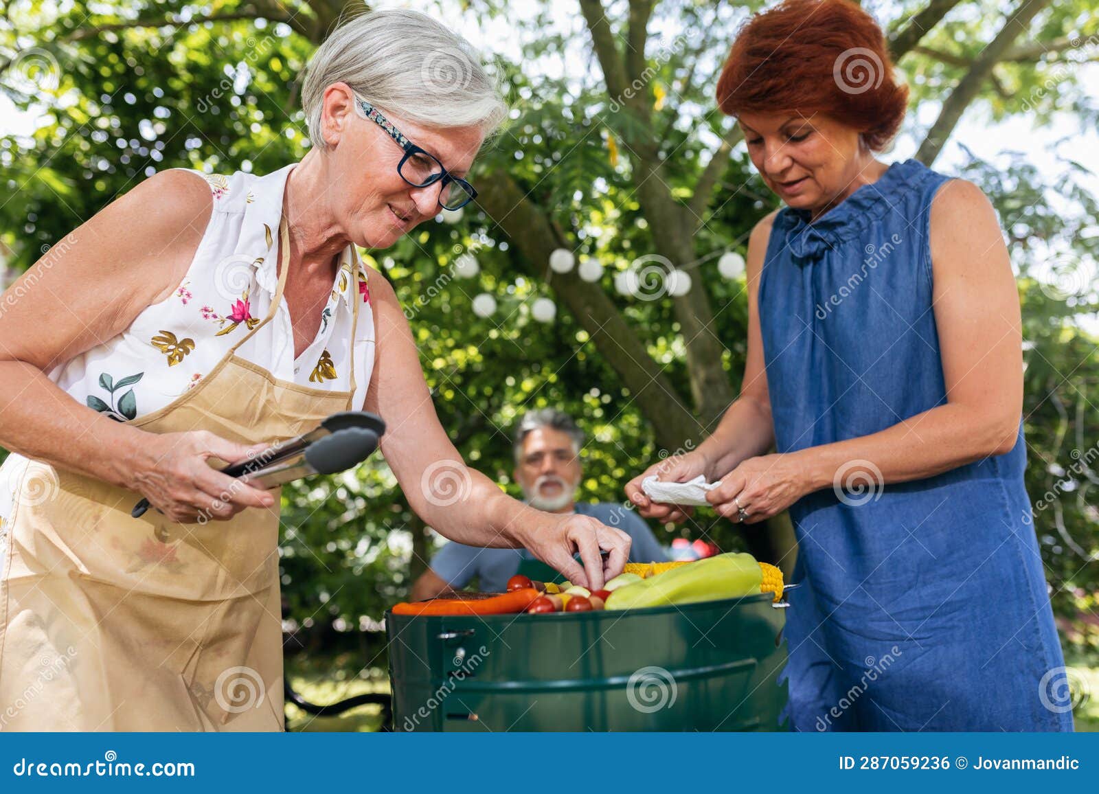 Senior People are Making Barbeque, Drinking Beverages, Making Memories ...