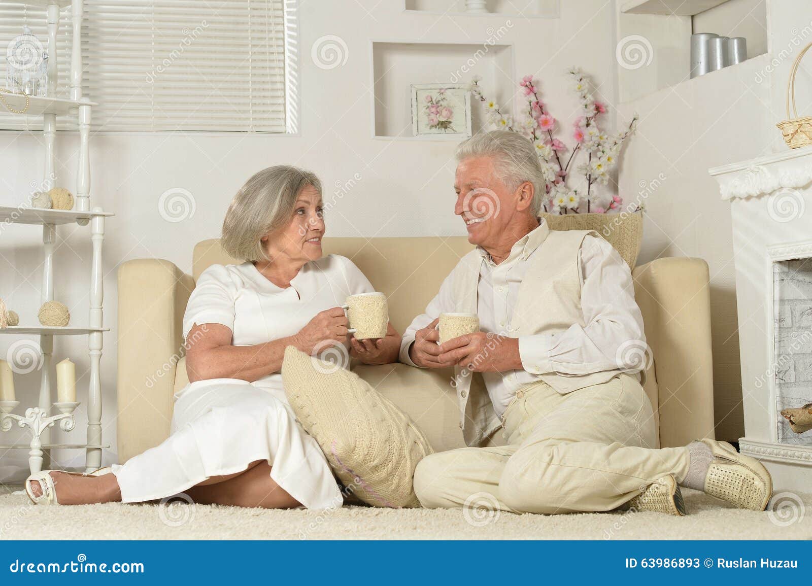 Elderly people with tea stock image. Image of couple - 63986893
