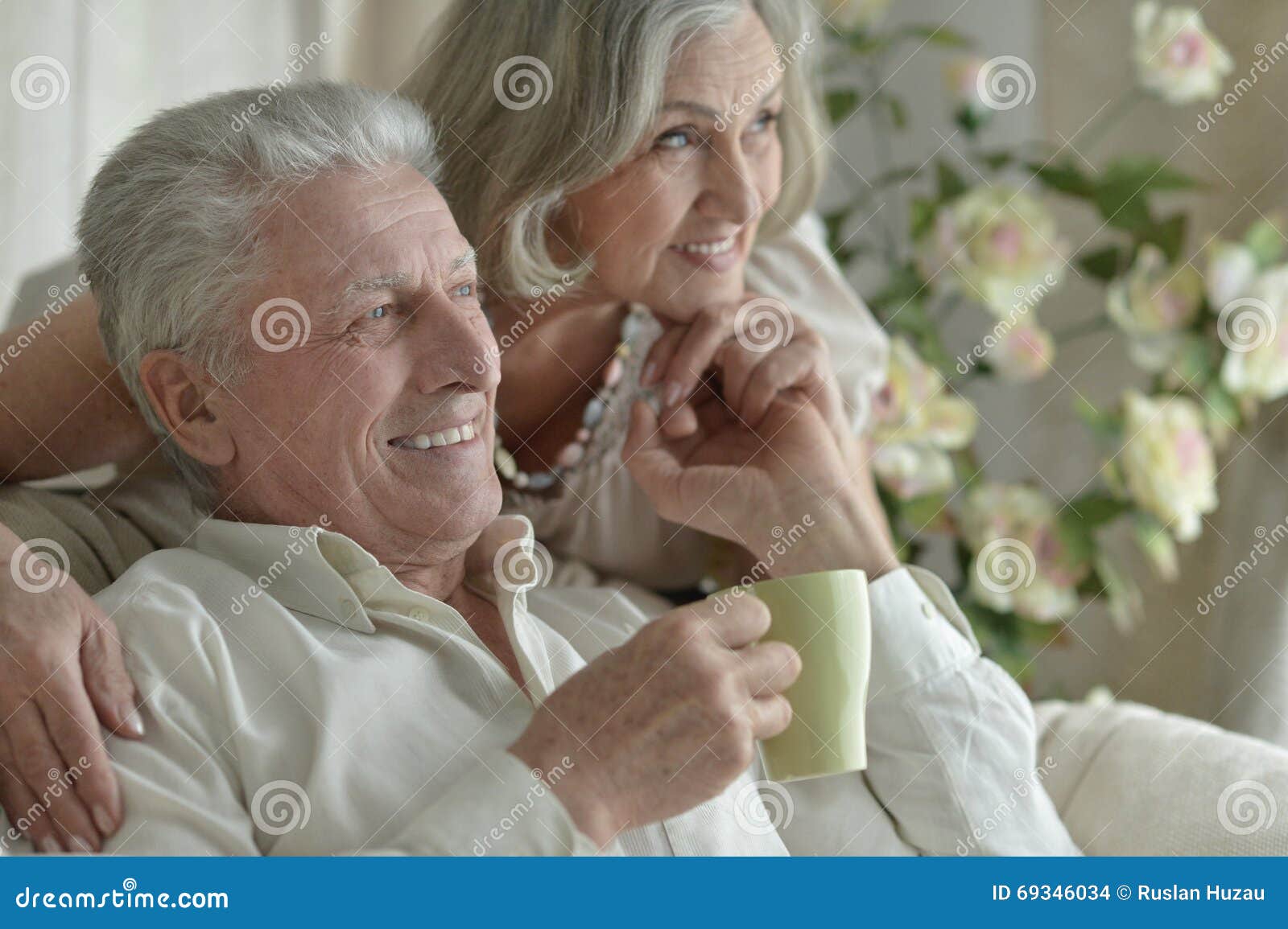 Elderly people with tea stock photo. Image of tender - 69346034