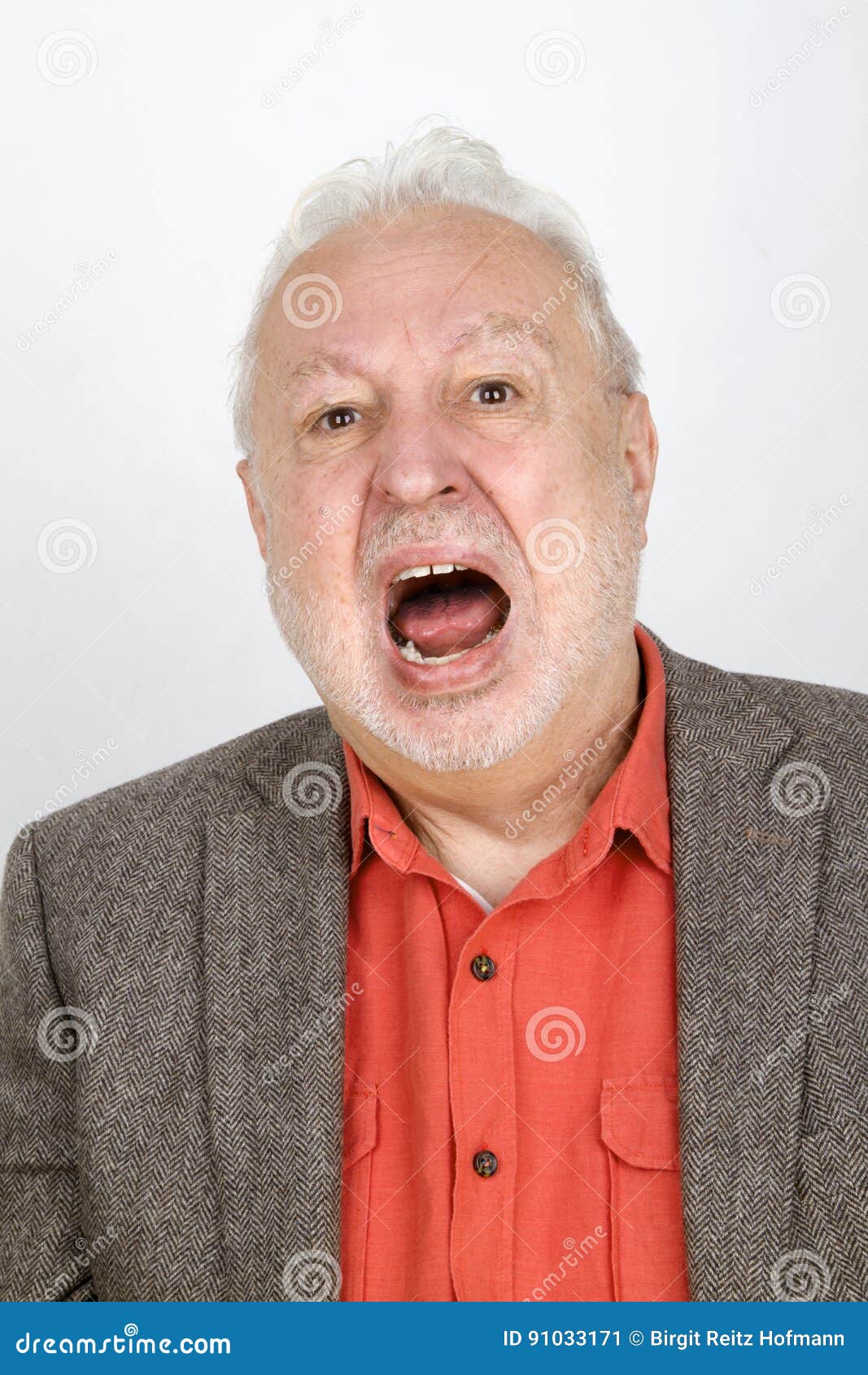 Aggressive Elderly Woman Is Threatened With A Fist While Sitting On ...