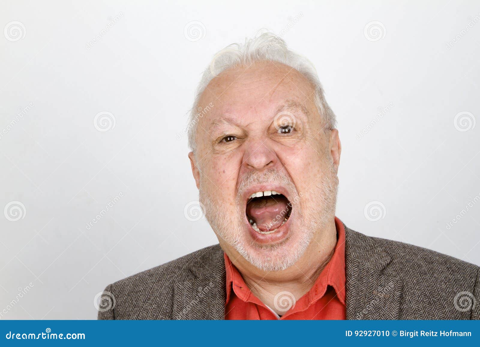 Aggressive Elderly Woman Is Threatened With A Fist While Sitting On ...