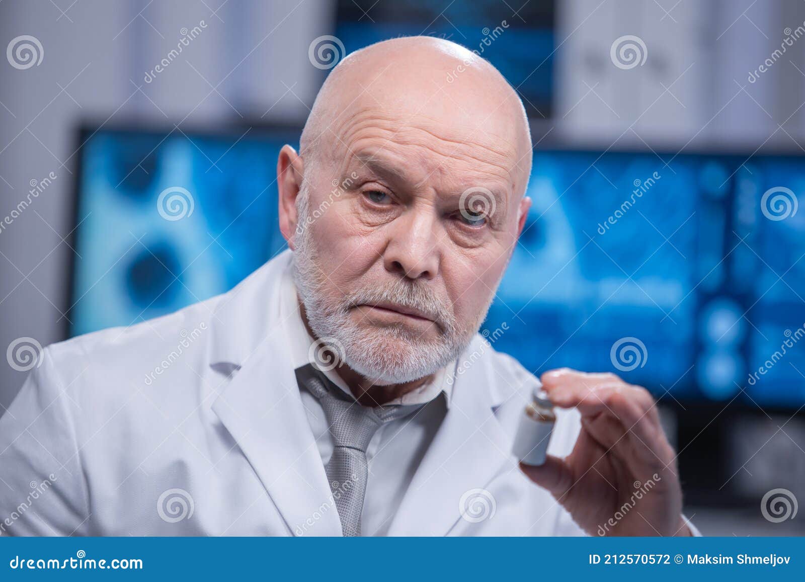 Elderly Professor is Doing a Science Experiment in a Modern Laboratory ...
