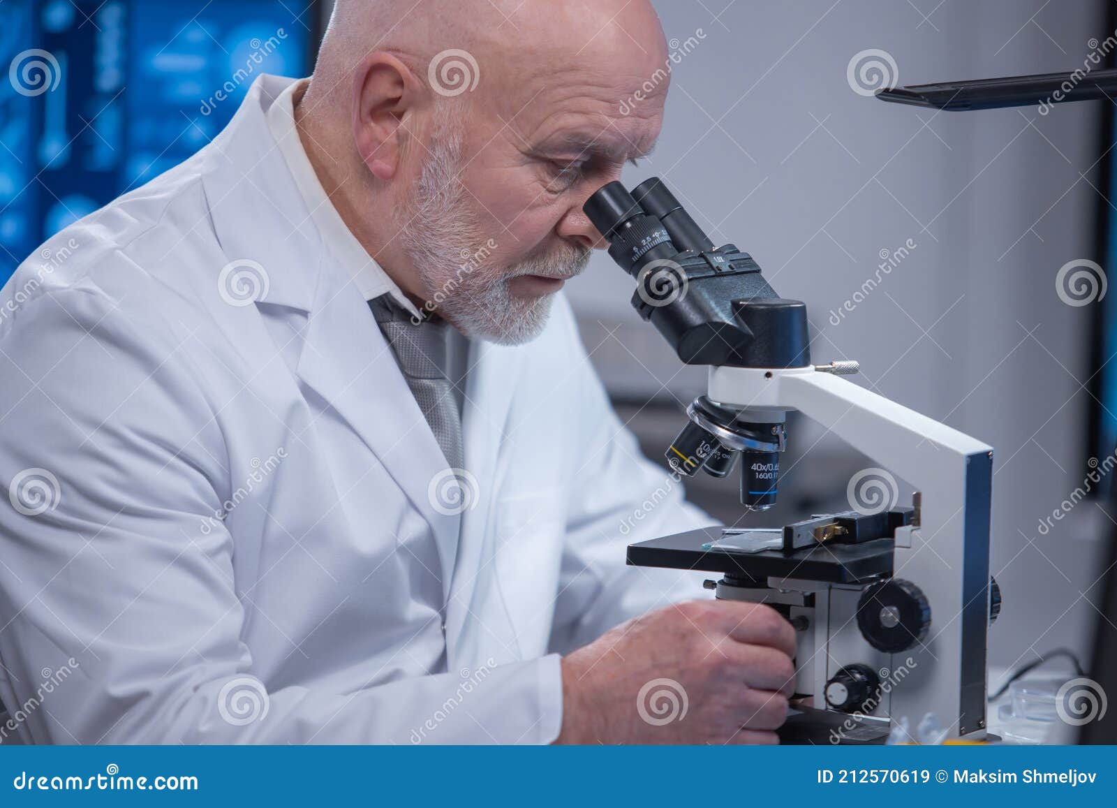 Elderly Professor is Doing a Science Experiment in a Modern Laboratory ...