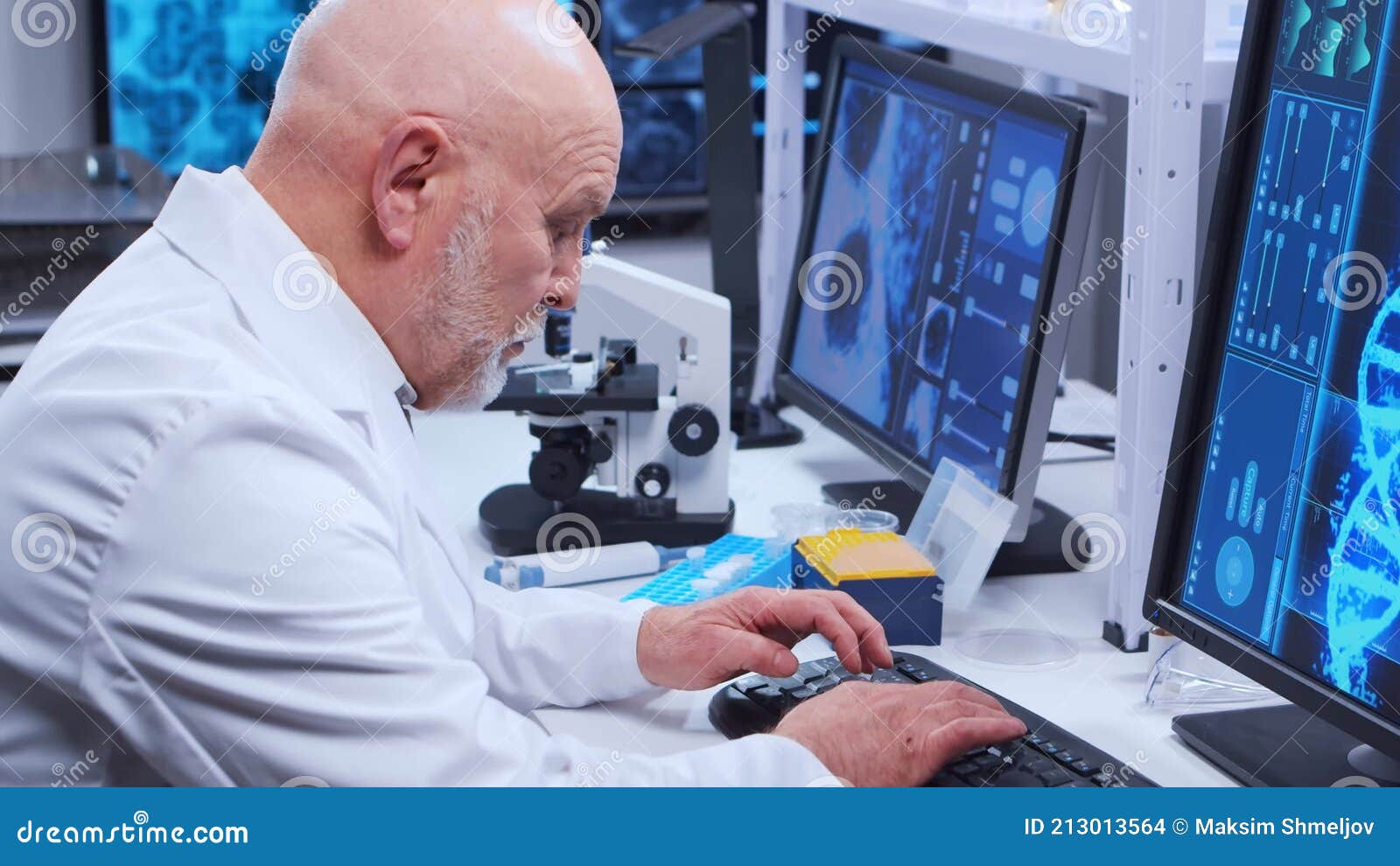 Elderly Professor is Doing a Science Experiment in a Modern Laboratory ...