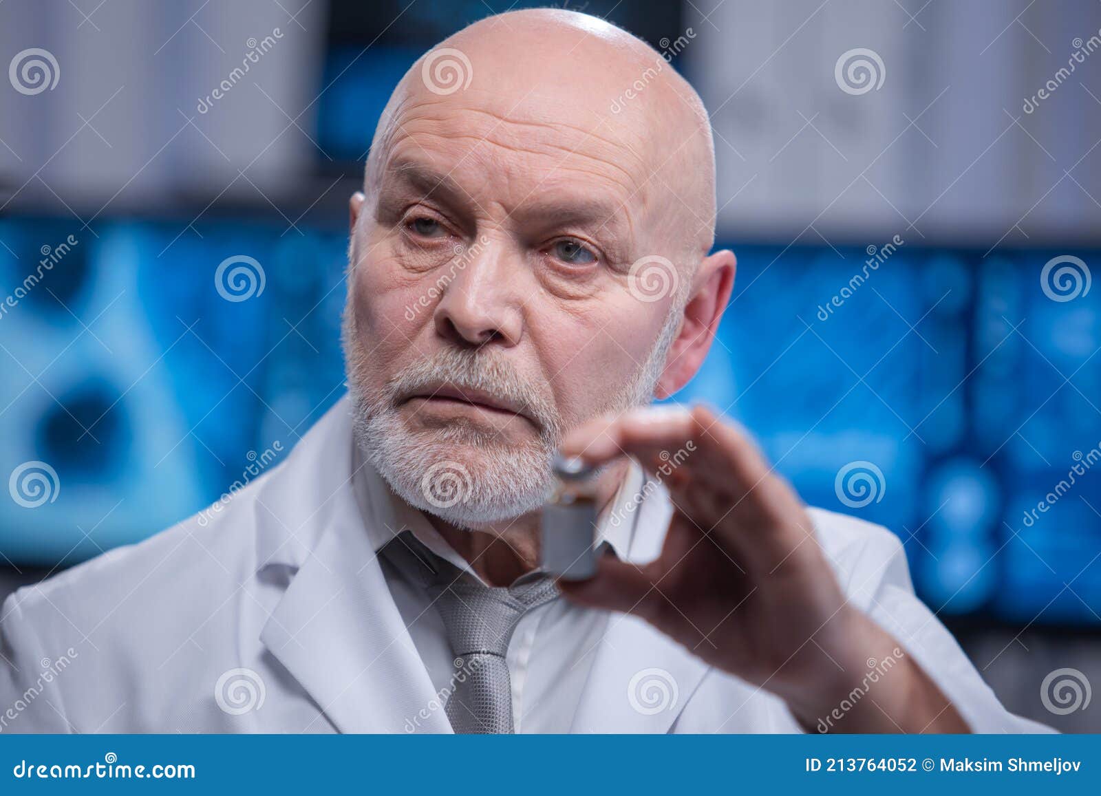 Elderly Professor is Doing a Science Experiment in a Modern Laboratory ...