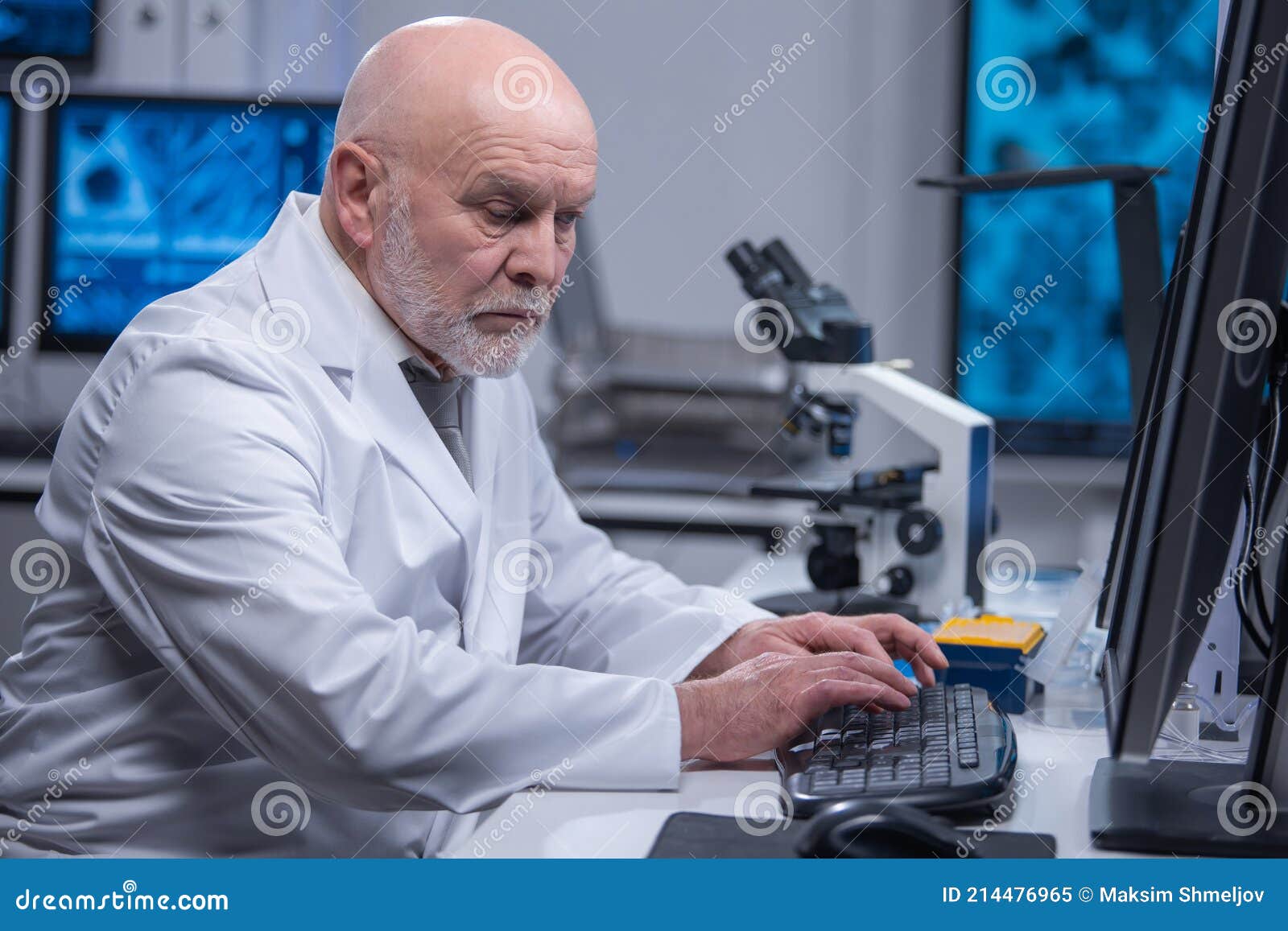 Elderly Professor is Doing a Science Experiment in a Modern Laboratory ...
