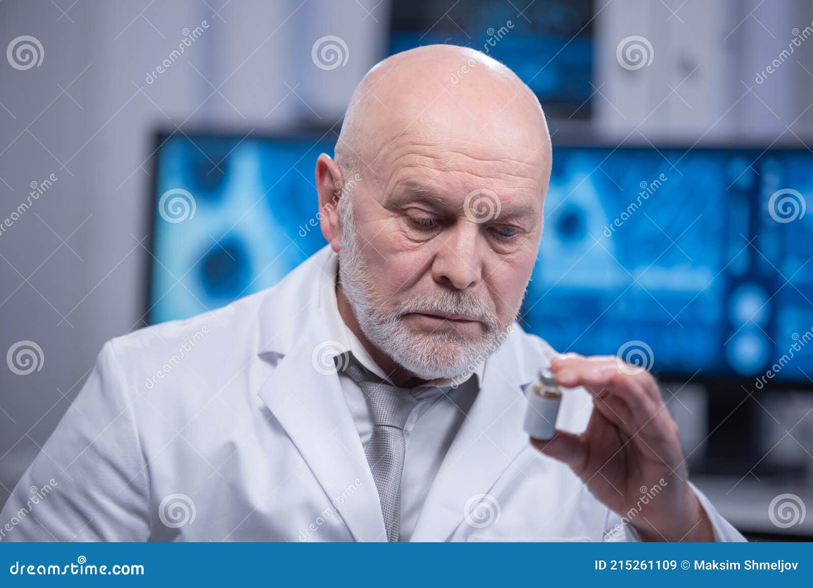 Elderly Professor is Doing a Science Experiment in a Modern Laboratory ...