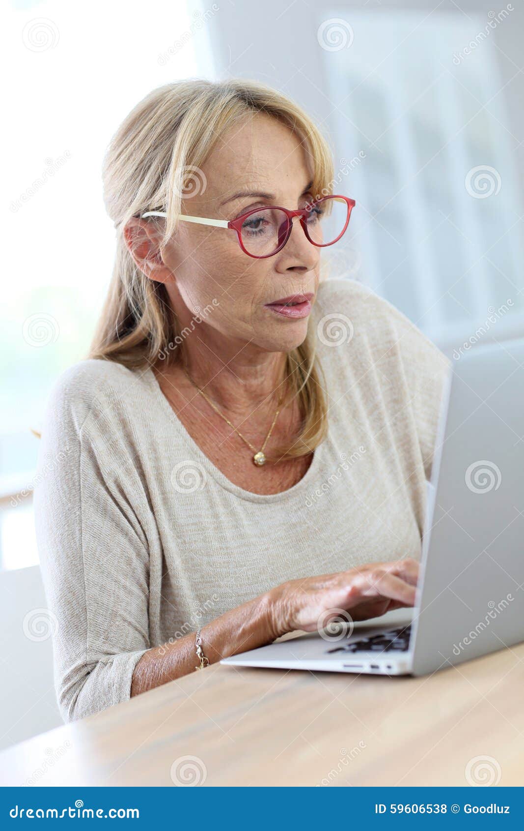 Elderly Senior Woman Typing on Laptop Stock Photo - Image of table ...