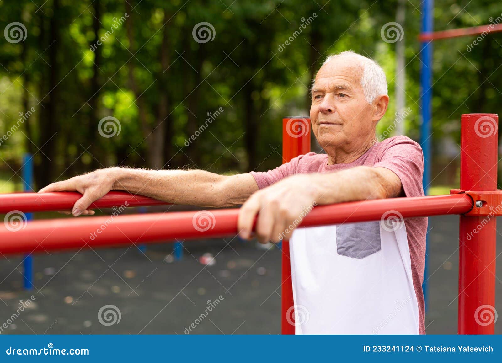 Elderly Sportive Man Doing Parallel Bars Exercise in Park Stock Photo ...