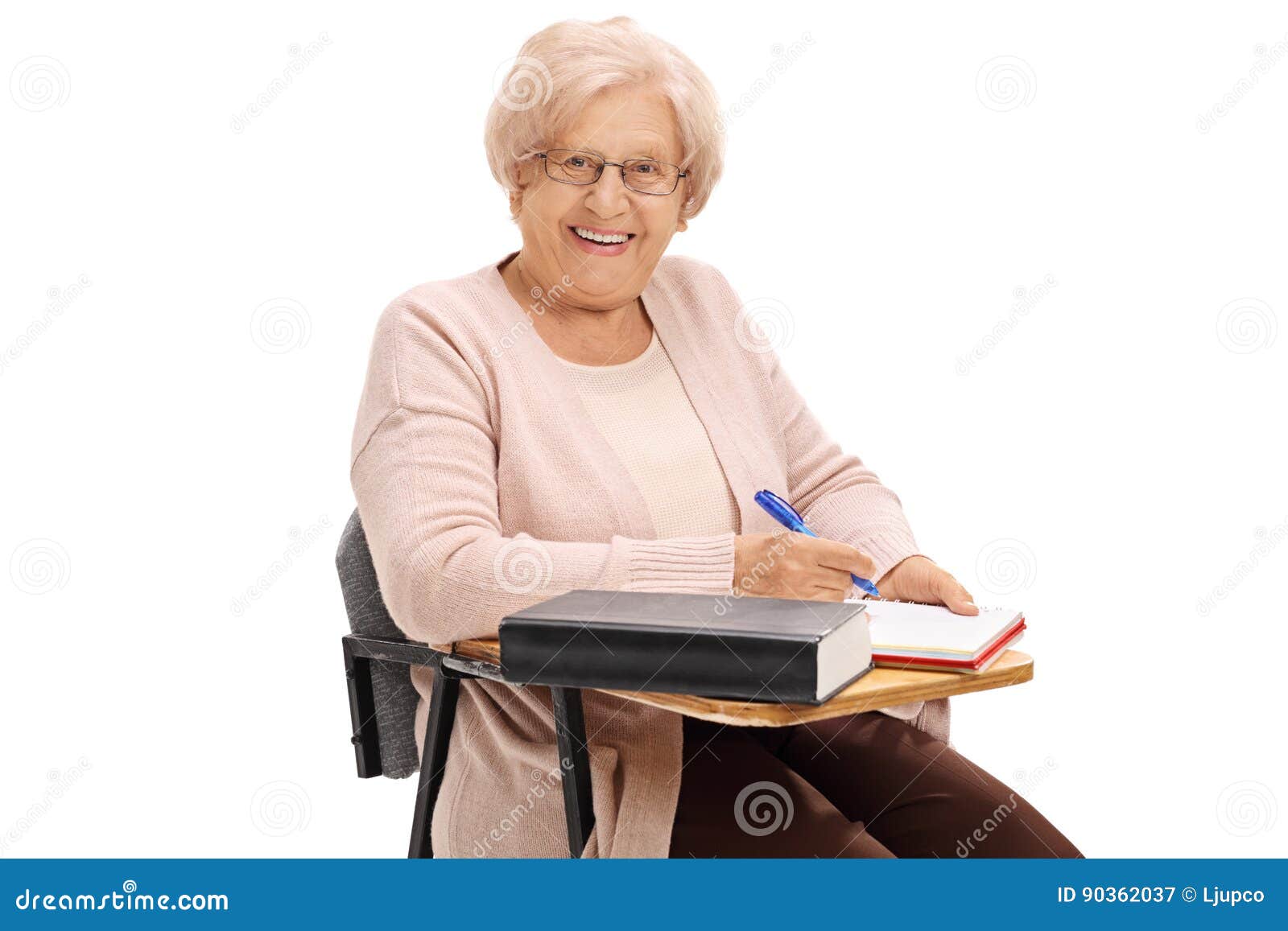 Elderly Student in a School Chair Taking Notes Stock Image - Image of ...