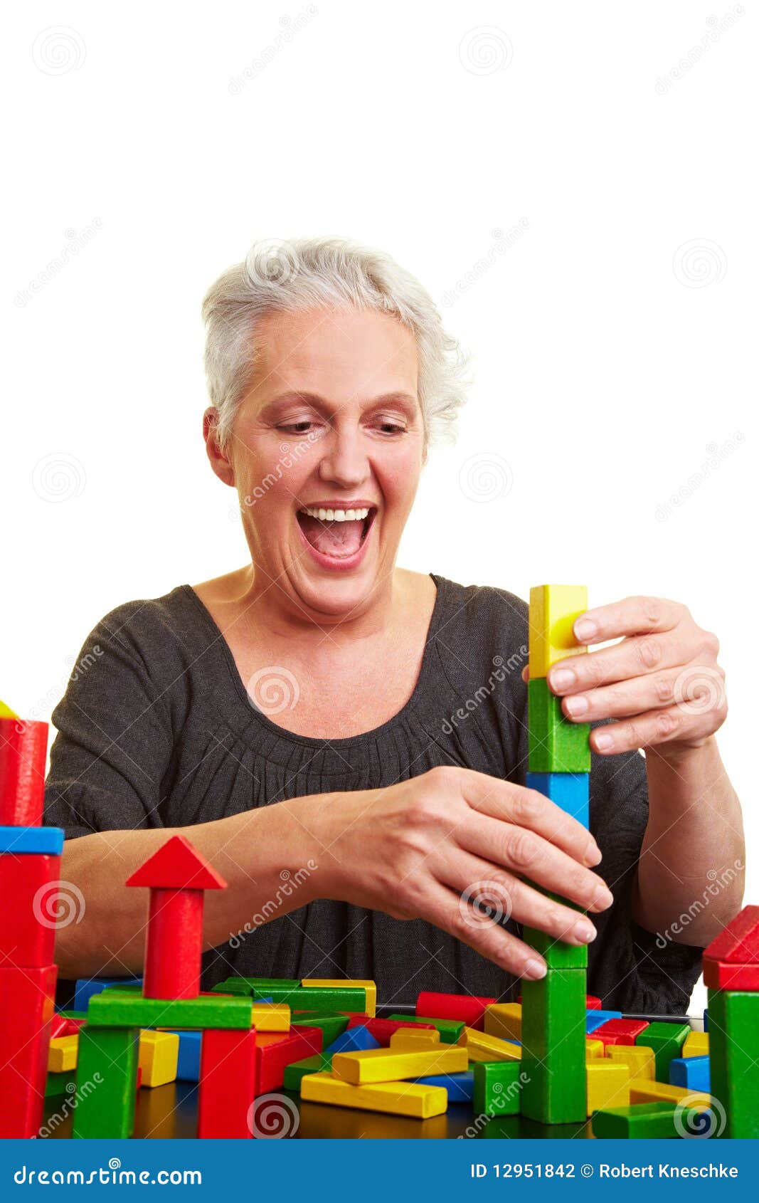 Elderly Woman Building a Brick Stock Photo - Image of block ...
