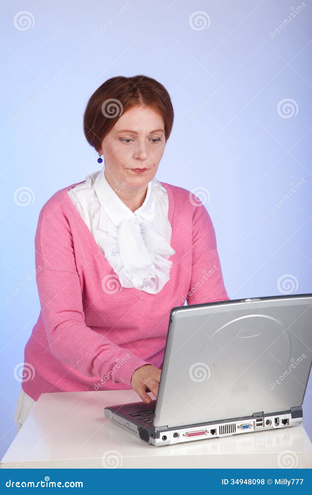 An Elderly Woman at the Computer Stock Photo - Image of handcarves ...