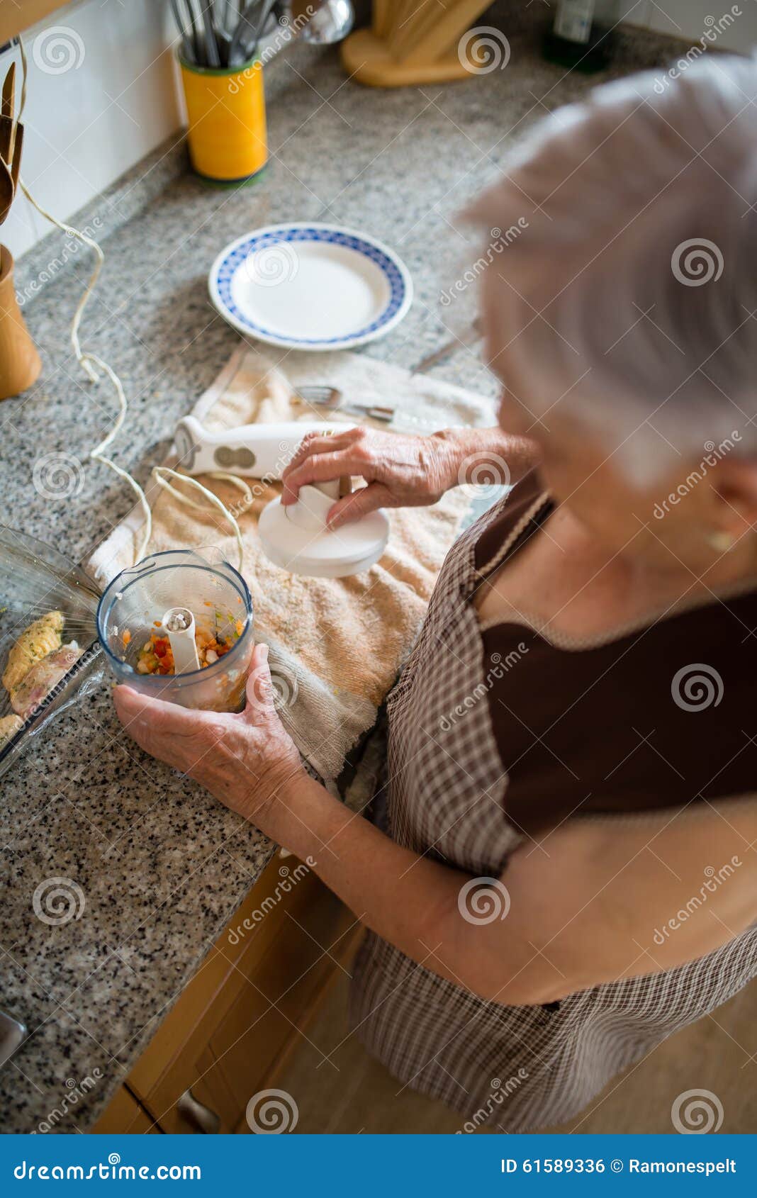 Elderly Woman Cooking in the Kitchen Stock Photo - Image of mature ...