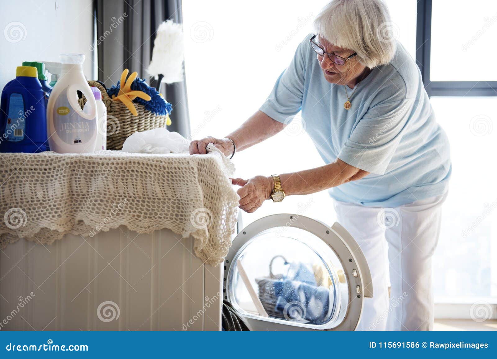 Elderly Woman Doing a Laundry Editorial Photo - Image of equipment ...