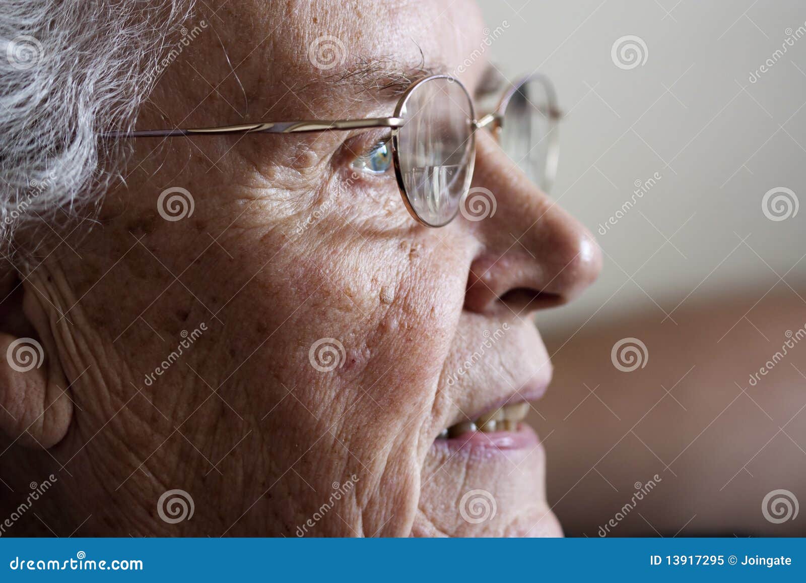 Elderly Woman Gazing and Smiling from Side Stock Image - Image of ...