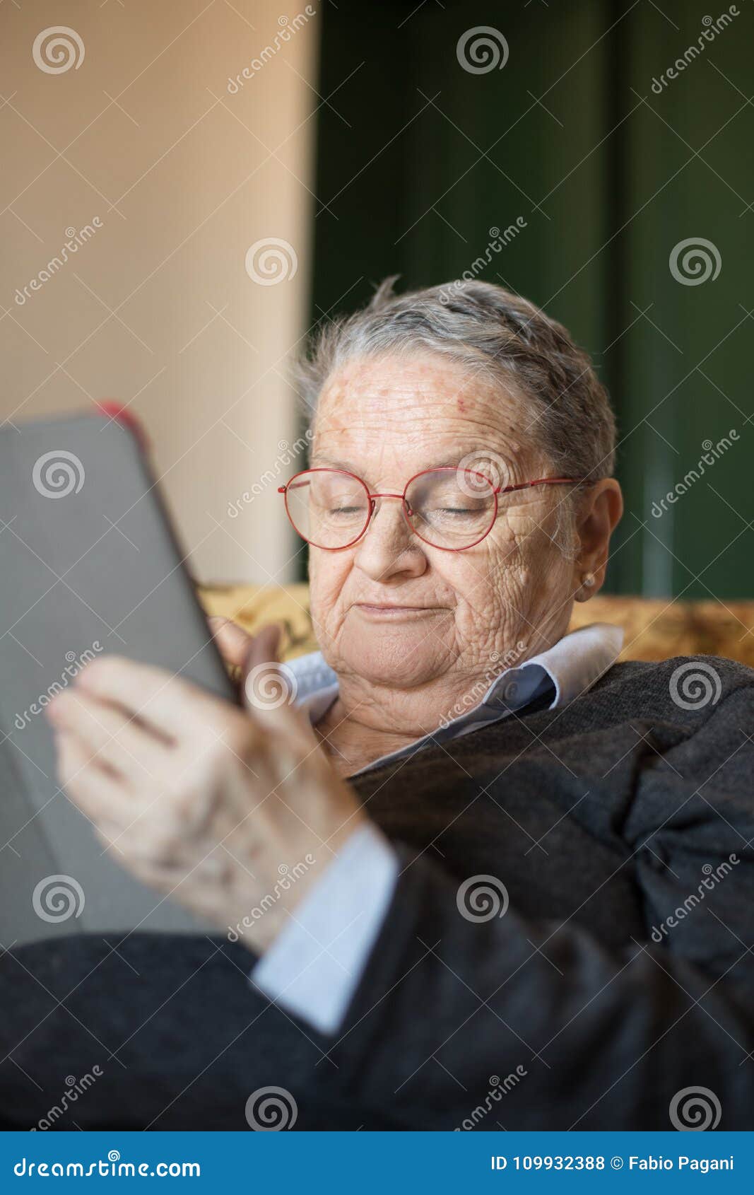 Elderly Woman Using Tablet E-book Stock Photo - Image of reading ...