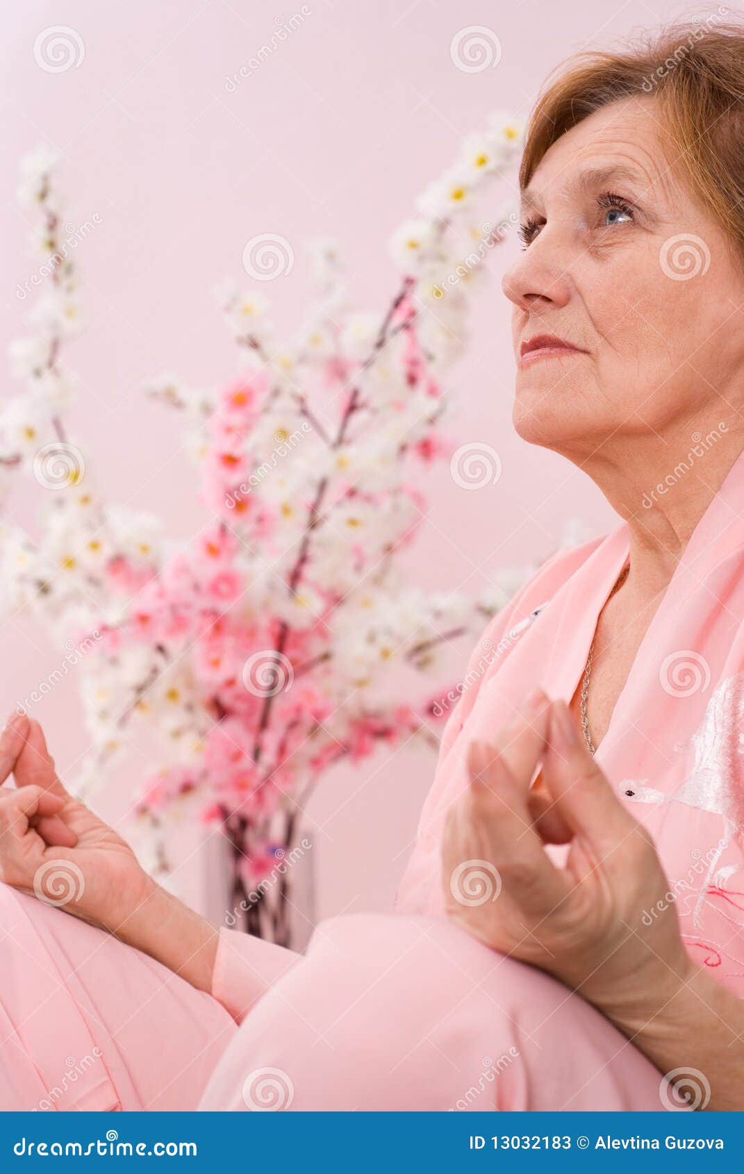Elderly woman meditating stock image. Image of alternative - 13032183