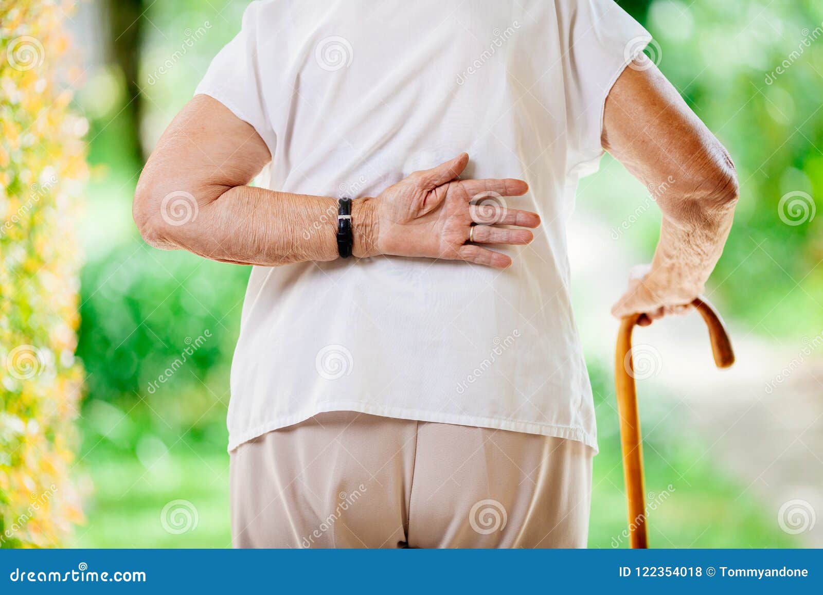 Elderly Woman Outdoors with Back Pain Stock Photo - Image of medical ...