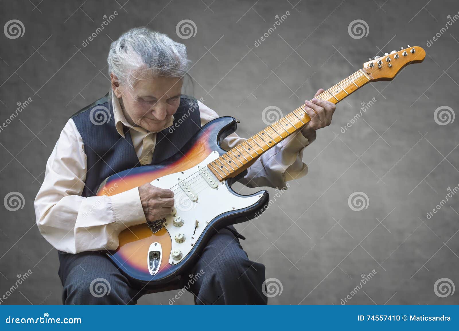 Elderly Woman Playing Guitar. Stock Photo - Image of song, pretty: 74557410