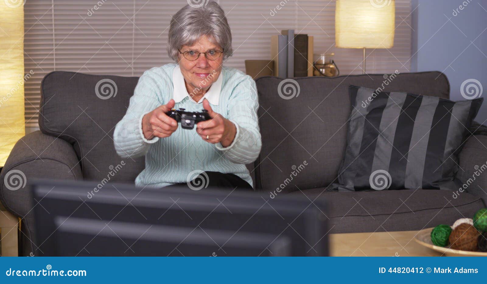 Elderly Woman Playing Videogames Stock Photo - Image of leisure, grey ...