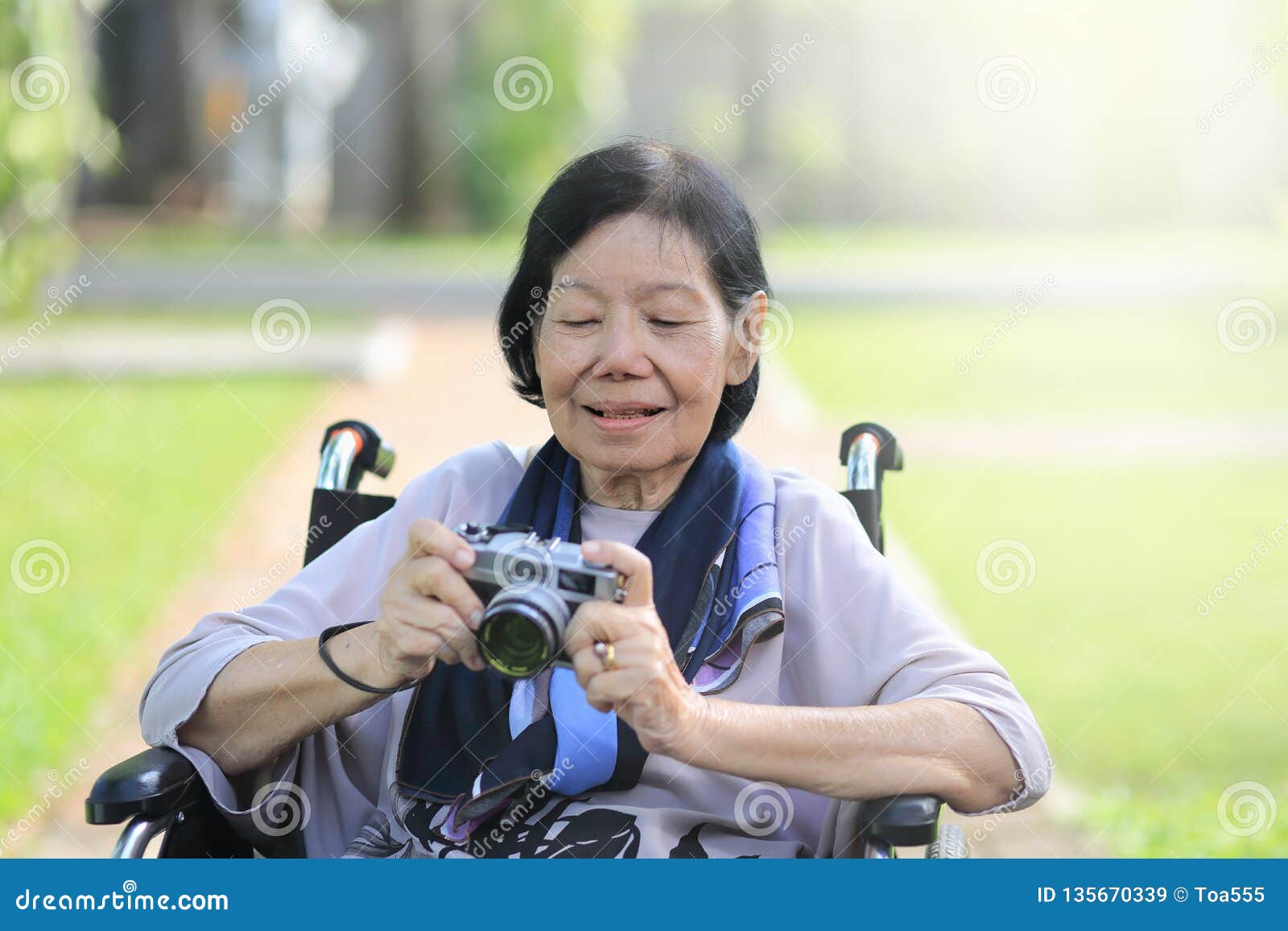 Elderly Woman Relax with Hobby in Backyard Stock Image - Image of ...