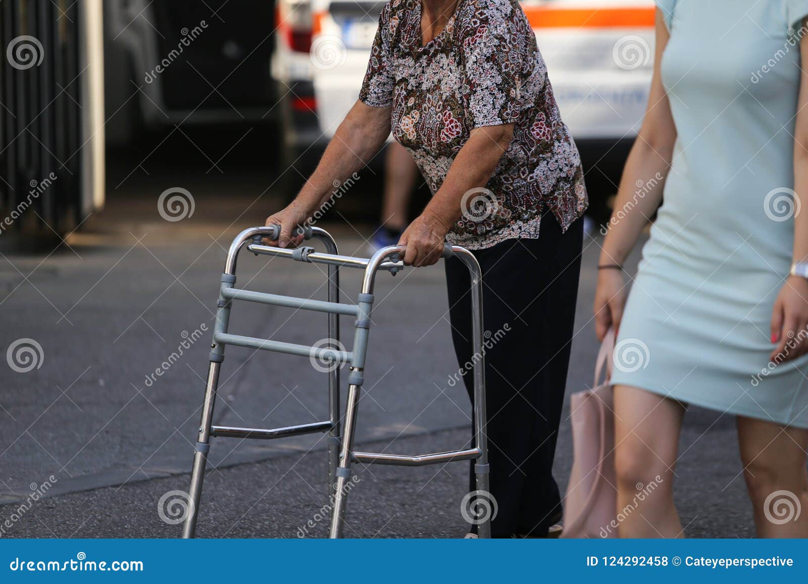 Elderly Woman Using a Metal Walker Stock Photo - Image of alone ...