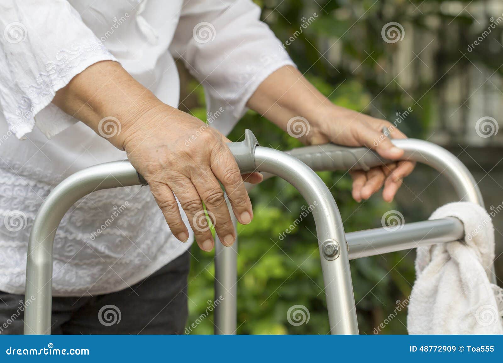 Elderly Woman Using a Walker Stock Image - Image of people, cane: 48772909