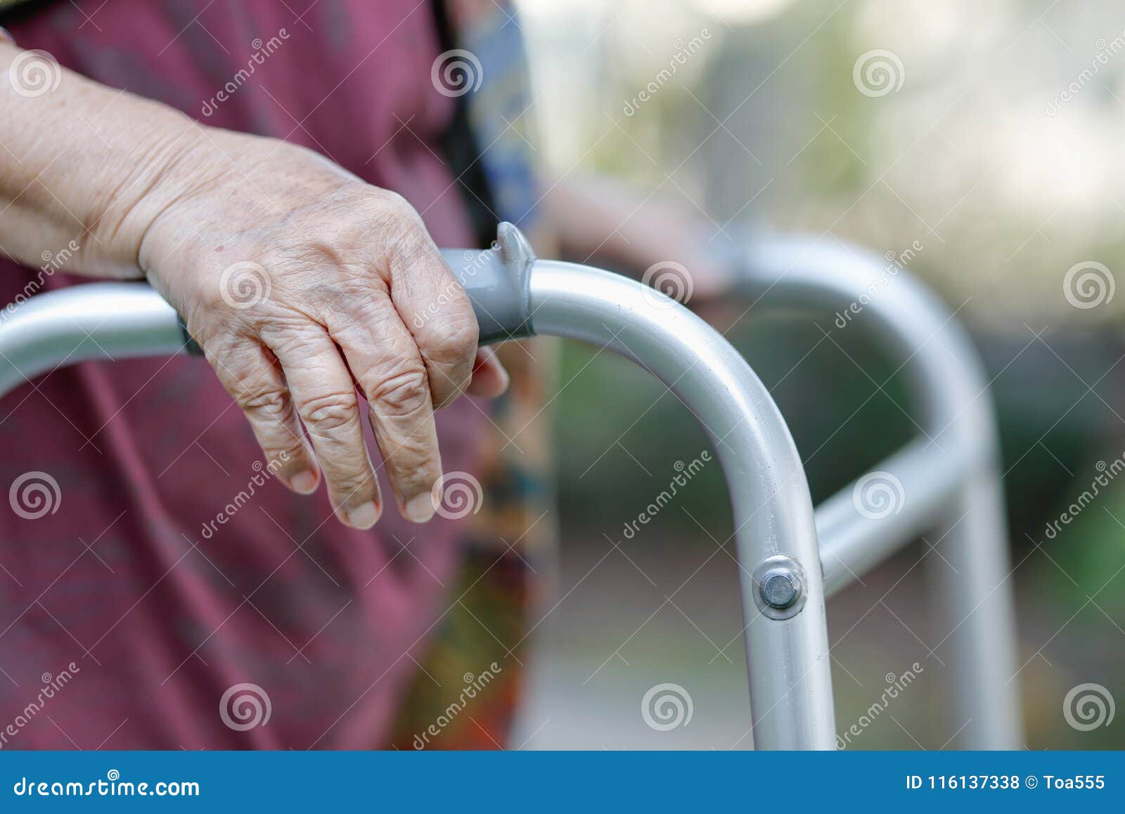 Elderly Woman Using a Walker in Backyard Stock Photo - Image of chinese ...