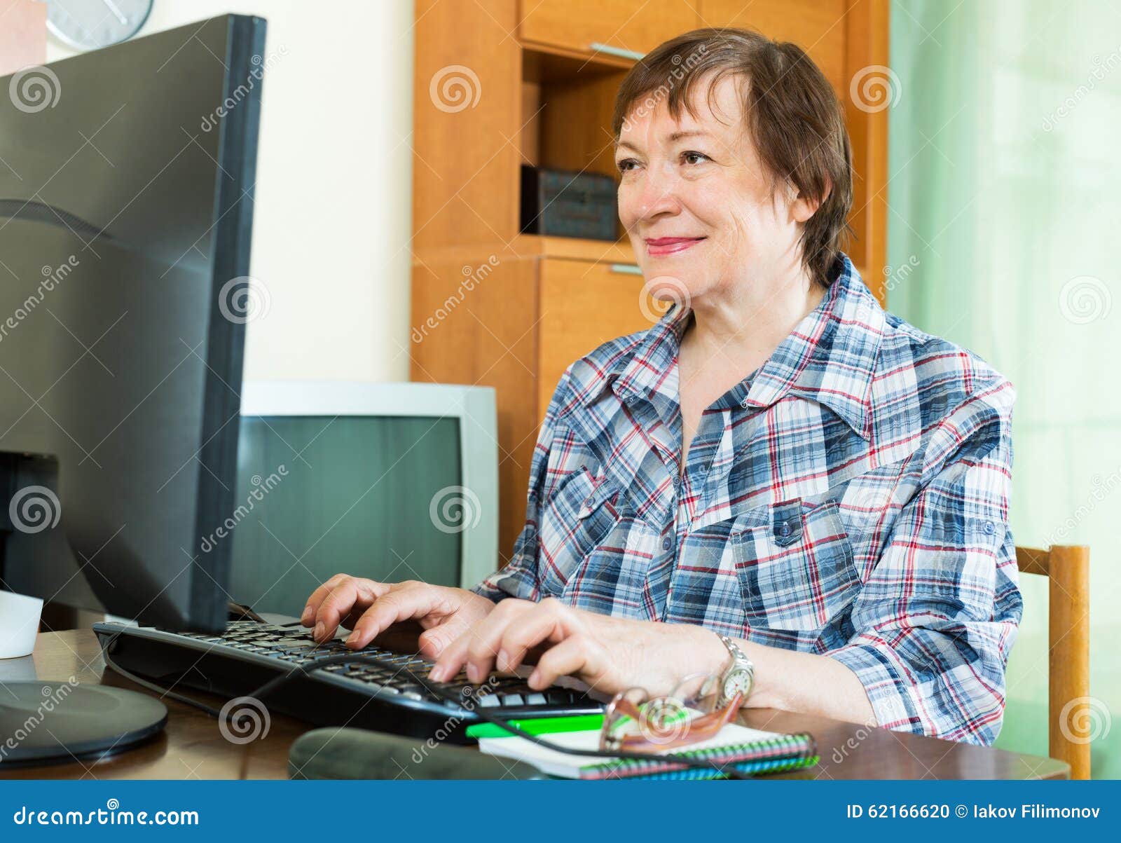Elderly Woman Working with Computer Stock Photo - Image of apartment ...
