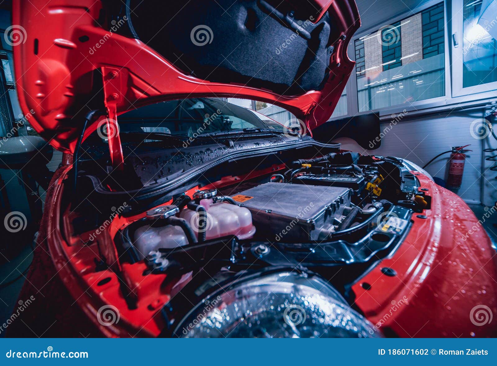 Electic Car with Open Hood. Details of Electric Car Engine Stock Photo ...
