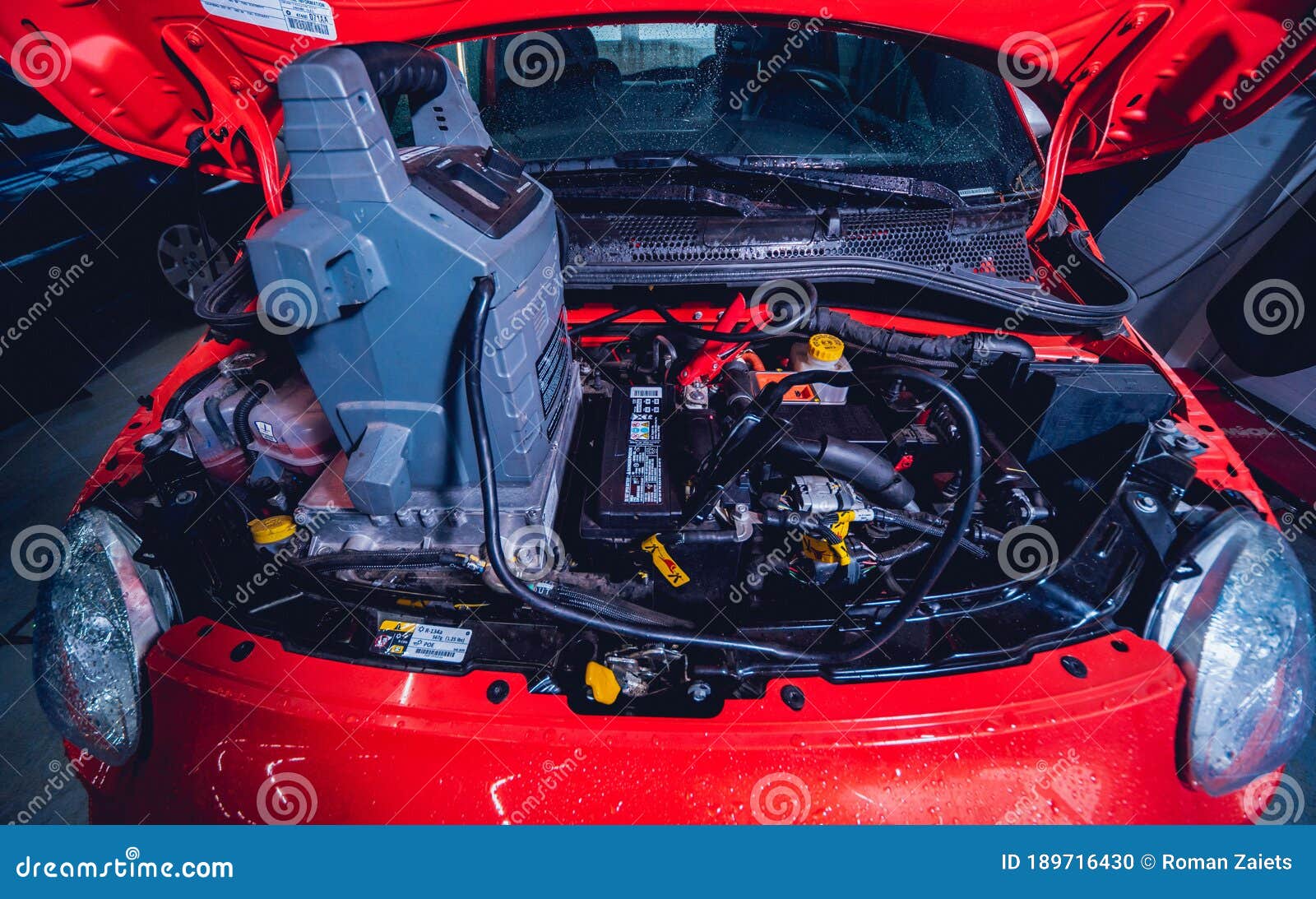 Electic Car with Open Hood. Details of Electric Car Engine Stock Photo ...