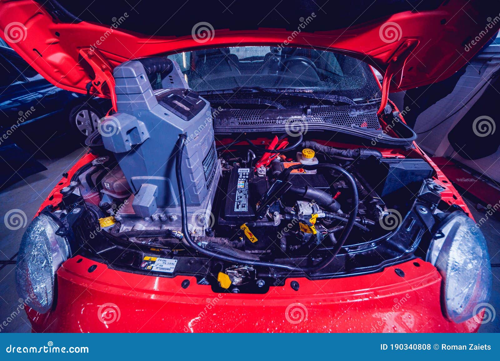 Electic Car with Open Hood. Details of Electric Car Engine Stock Photo ...