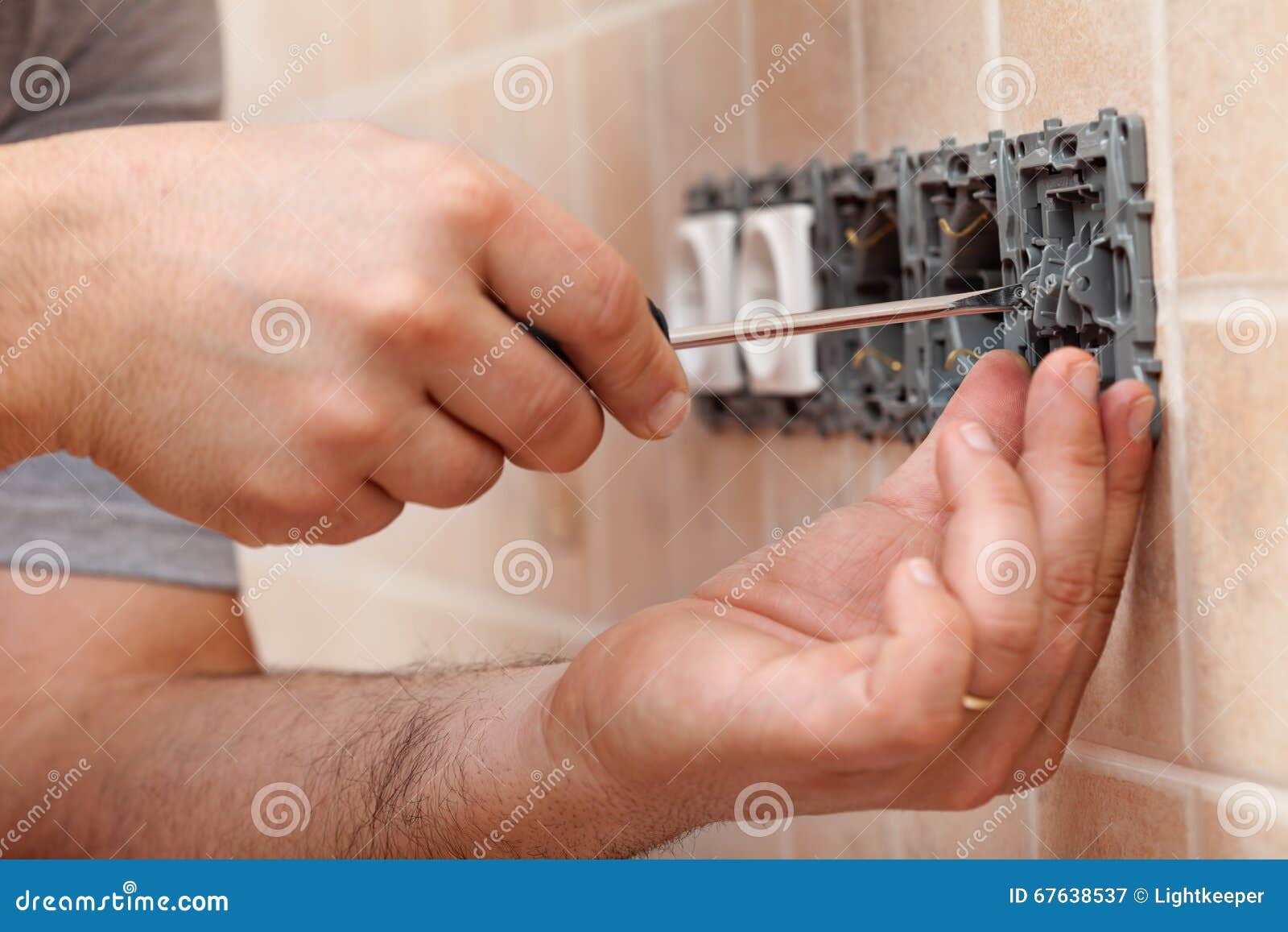 Electician Hands Installing Electrical Wall Fixture Stock Image - Image ...