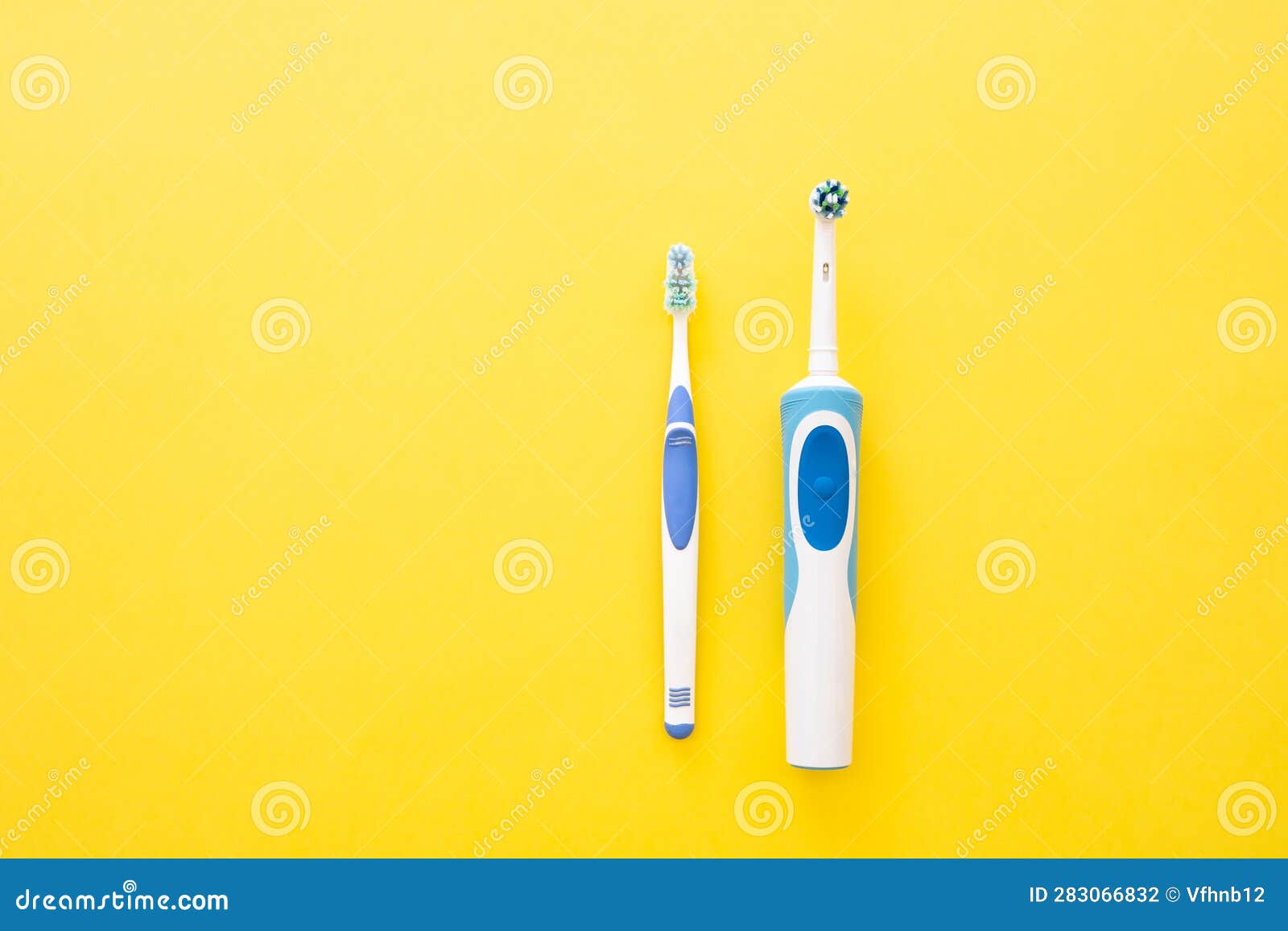 Electric and Analog Toothbrush in Blue on a Yellow Background Stock ...
