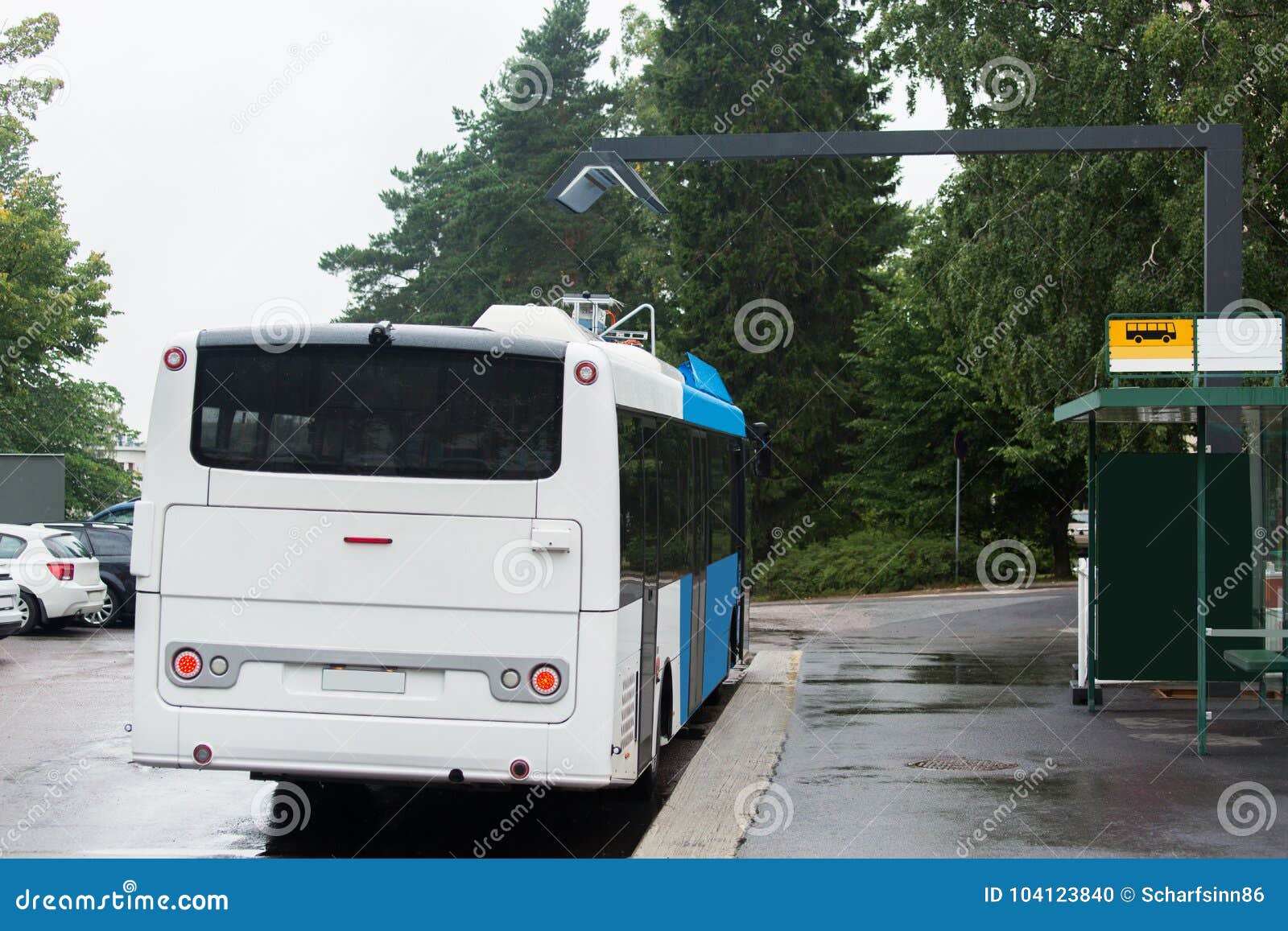 Electric bus at a stop stock photo. Image of vehicle - 104123840